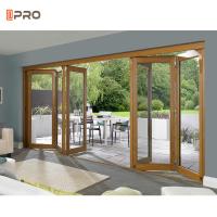 China Custom Veranda Exterior Accordion Aluminum Bifold Door Glass Sliding Patio Door for sale
