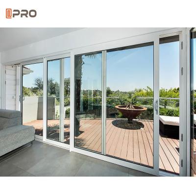 China Telescopic Balcony Sliding Glass Door Triple Glass Aluminum Sliding System Door for sale