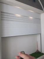 China Contemporary Aluminum Garage Door Automatic Bi Folding Roller Shutter for sale