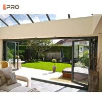 China 2.0mm Thickness Aluminum Folding Doors Exterior Portable Balcony Glass Bi Fold Door With Plexiglass for sale