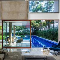 China Aluminum Alloy Glass Sliding Folding Door Soundproof Window Customized Broken Bridge Aluminum Alloy Sliding Casement Door And Window Sealed Balcony Double-glazed Bi-folding Door for sale