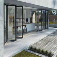 China Modern Aluminum Folding Door Soundproof Storm Glass Door Patio Door Sturdy for sale
