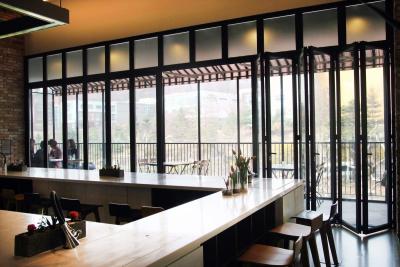 China Powder Coated Bi-fold Doors Energy Efficient And Durable Aluminium Folding Doors for sale