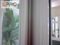 China Durable Entrance Aluminum Folding Doors , Thermal Break Lowe Sound Insulation Bi Fold Door for sale