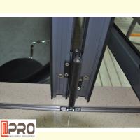 China Durable Wood Grain Aluminum Bifold Windows With Nylon Fly Screen Customized Size folding balcony window australia fold for sale
