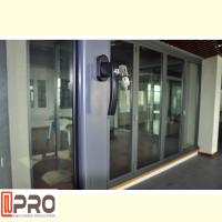 China Durable Wood Grain Aluminum Bifold Windows With Nylon Fly Screen Customized Size folding balcony window australia fold for sale