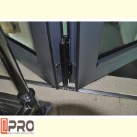 China Durable Wood Grain Aluminum Bifold Windows With Nylon Fly Screen Customized Size folding balcony window australia fold for sale