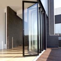 China Kitchen Custom Bi Fold Aluminum Folding Doors For Veranda for sale
