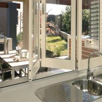 China Balcony Vertical Screen Aluminum Bifold Windows for sale