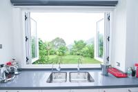 China Aluminum Sliding Kitchen Glass Balcony Folding Window for sale