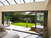 China Aluminium 6063 Double Tempered Glass Folding Door for sale
