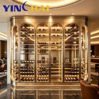 China Curved Champagne Gold Stainless Steel Constant Temperature Wine Cabinet App Control for sale