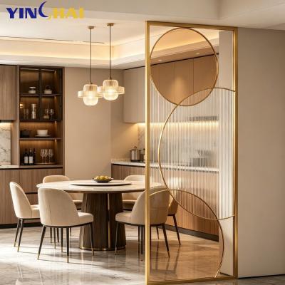 China Custom Stainless Steel Screen Partition With Art Circular Metal Frame And Fluted Glass for sale