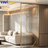 China Custom Stainless Steel Screen Partition With Art Circular Metal Frame And Fluted Glass for sale