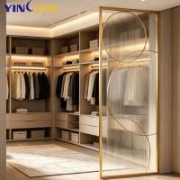 China Custom Stainless Steel Screen Partition With Art Circular Metal Frame And Fluted Glass for sale