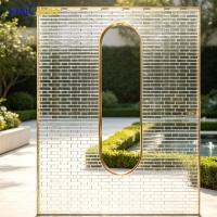 China Custom Stainless Steel Screen Partition With Glass Brick And Oval Hollow Frame for sale