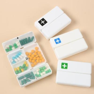 China Plastic Foldable Medicine Pill Organizer Box 10x7x2.5cm Travel Medical Box for sale