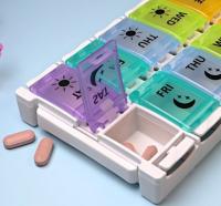 China 14 Case 7 Day Weekly Plastic Pill Box Case Organizer with Button for sale