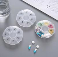 China 7 Compartments Medicine Pill Organizer Round Shape PP Materials Clear Weekly Plastic Pill Box for sale