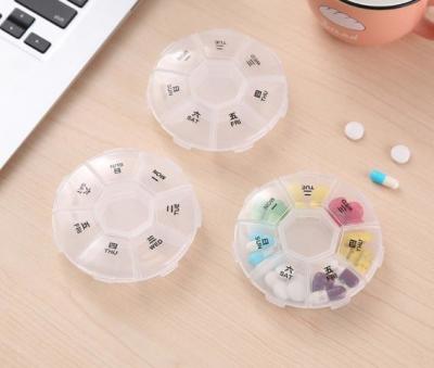 China Round Shape Pill Dispenser Organizer Clear Plastic Daily Weekly Pill Storage Box 17.5x8.5x3cm for sale