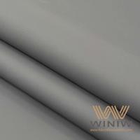 China Nonwoven Faux Leather Upholstery Fabric Raw Material For Automotive Products for sale