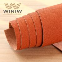 China Competitive Price Orange PVC Synthetic Leather Breathable  Durable luxurious property auto upholstery leather for sale