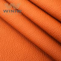 China Competitive Price Orange PVC Synthetic Leather Breathable  Durable luxurious property auto upholstery leather for sale
