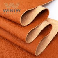 China Competitive Price Orange PVC Synthetic Leather Breathable  Durable luxurious property auto upholstery leather for sale