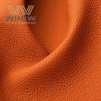 China Competitive Price Orange PVC Synthetic Leather Breathable  Durable luxurious property auto upholstery leather for sale