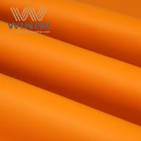 China Microfiber Fluorescent Orange Printed Faux Leather Sheets For Couch Decoration for sale