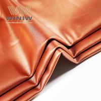 China 1.4mm Orange Micro Fiber PU Vegan Leather Bags Making Leather Fabric Material for sale