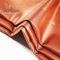 China 1.4mm Orange Micro Fiber PU Vegan Leather Bags Making Leather Fabric Material for sale
