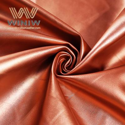 China Orange Color Micro Fiber Leather Cloth Material For Bags Making for sale