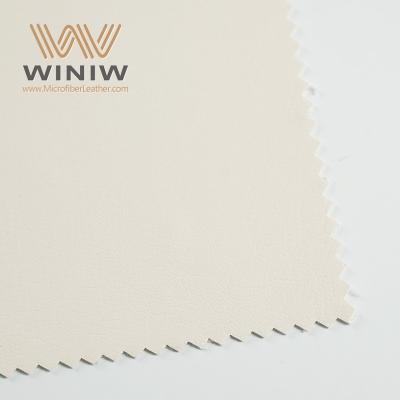 China Soft Microfiber Leatherette Material Imitation Leather Ladies Clothes Leather for sale