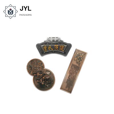 China Custom Zinc Alloy Embossed Metal Nameplates Sticker Label 2mm Thickness for sale