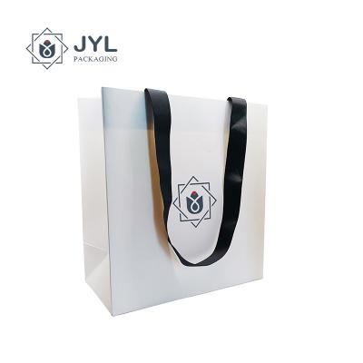 China RoHS Recycled Paper Gift Bags with Handles Antibacterial Rectangle 1000pcs for sale