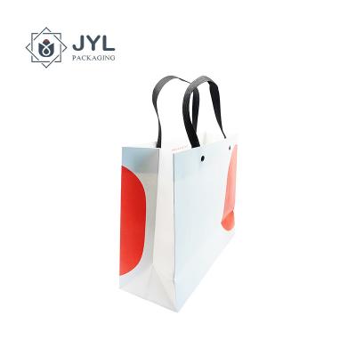 China Custom Eco-Friendly Cardboard Paper Bag for Cosmetics Perfume Packaging 1000 MOQ for sale