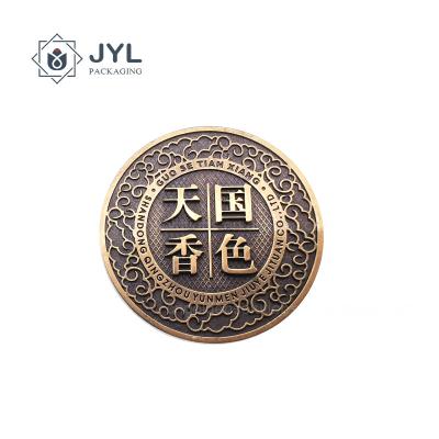 China Custom Embossed Zinc Alloy Metal Label Sticker 3mm Thickness Bronze Round Nameplate for sale