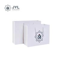 China Moistureproof Shopping Bag with Ribbon Handle SA8000 Paperboard 1000pcs MOQ for sale