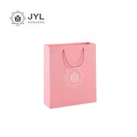China Custom Logo Antibacterial Cosmetic Paper Bag with Ribbon Handle 1000 Pcs MOQ for sale