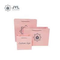 China Custom Logo Antibacterial Cosmetic Paper Bag with Ribbon Handle 1000 Pcs MOQ for sale