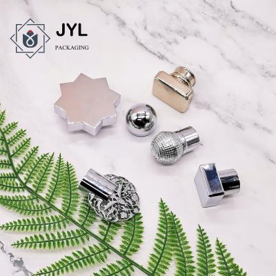 China Zinc Alloy Perfume Bottle Cap 20mm Custom Logo Manufacturer Silver Zamac Perfume Top for sale