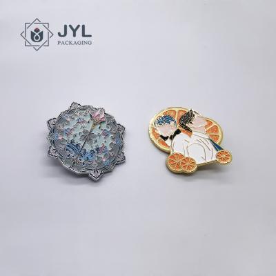China Custom Zinc Alloy 4mm Embossed Metal Label Stickers for Perfume Brand Logo Tags for sale