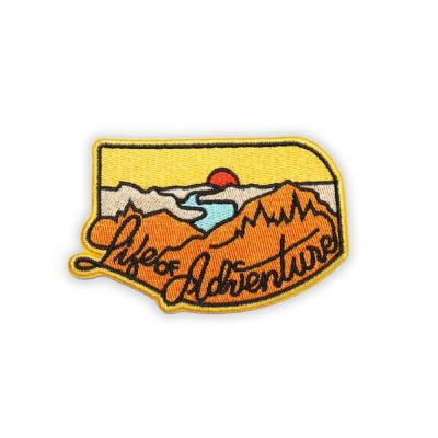 China Custom Embroidered Hat Patches Iron On Backing Sew On Applique Die Cut Border 100% Polyester for sale