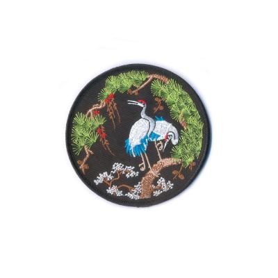 China Custom Embroidered Crane Patch Iron On Merrowed Border 9 Colors Cotton Polyester for sale