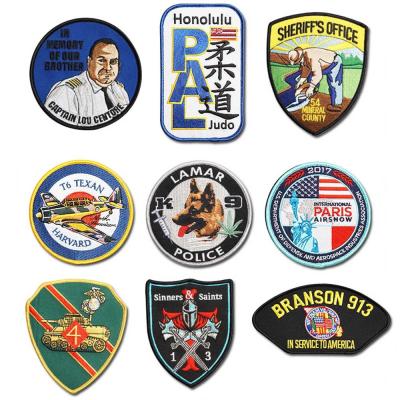 China Custom Embroidered Iron On Patches Military Navy Merrowed Sew On Badges 100% Embroidery for sale