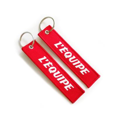 China Custom Embroidered Keychain Twill Merrowed Border 12 Colors OEM Logo 3-5 Day Sample for sale
