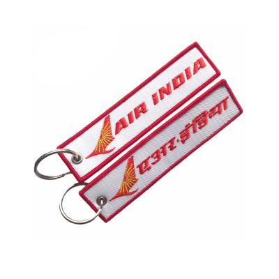 China Custom Embroidered Key Chain Tag Twill Merrowed 13cm x 3cm Souvenir Gift for sale