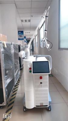 China Vertical Fractional CO2 Laser Beauty Machine 10.6μm for Skin Mole Acne Scar Removal Vaginal Tightening for sale