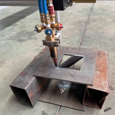China Mini Portable CNC Flame Cutting Machine 1500x3000mm with 63A-200A Plasma Options for Building Material Shops for sale